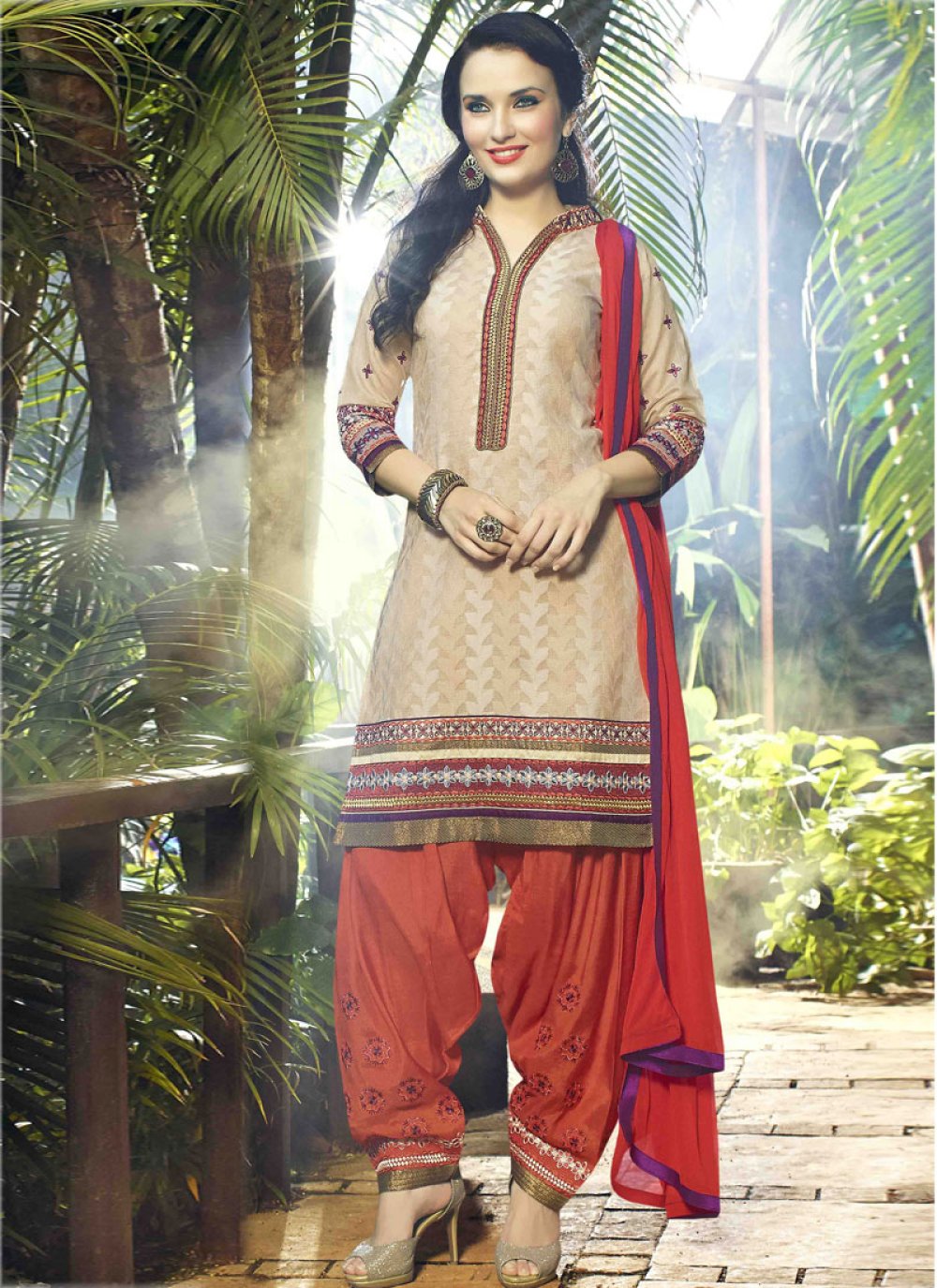 Conspicuous Cream Color Punjabi Salwar Suit